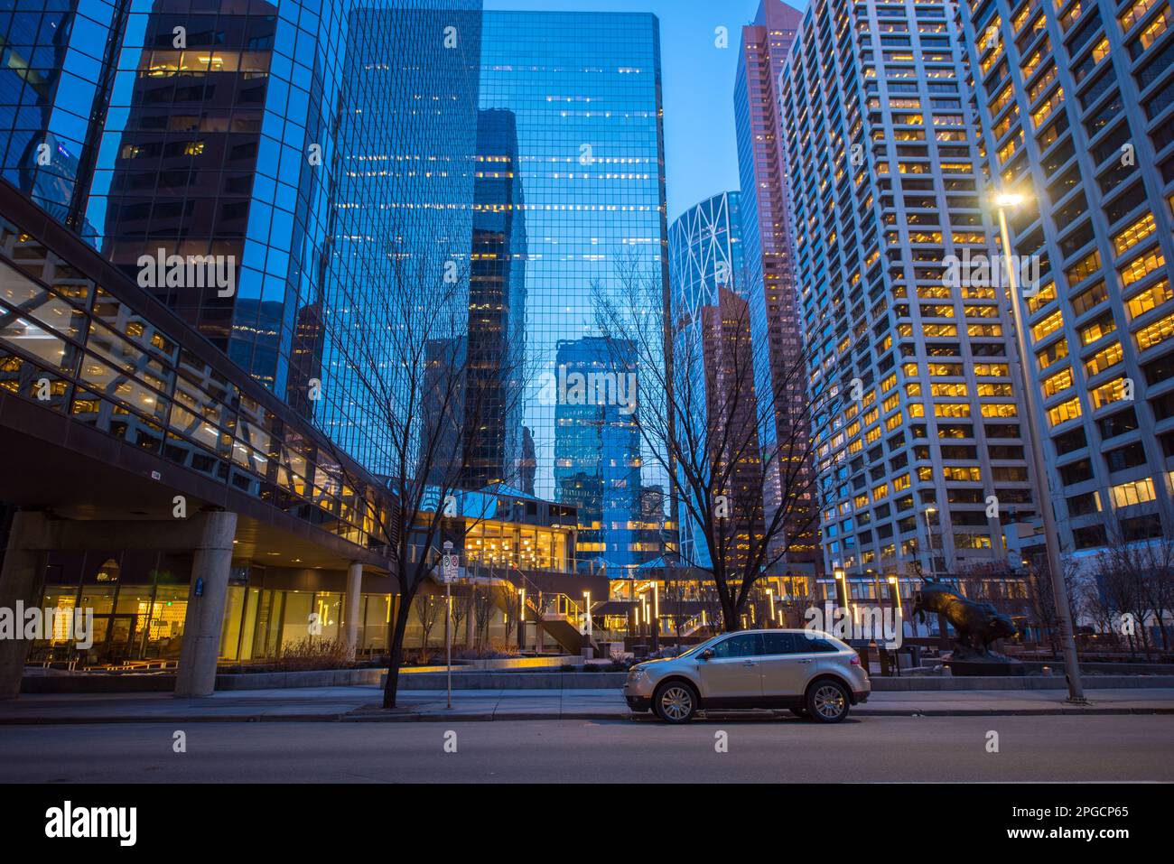 Contemporary high rise multistoried buildings with glass mirrored walls ...