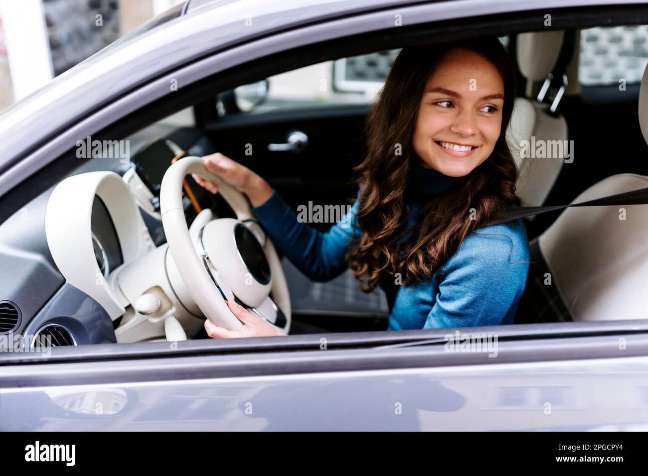 Woman car alone happy drive view hi-res stock photography and images ...
