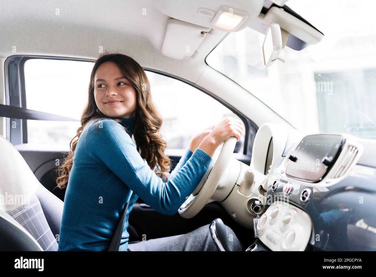Woman car alone happy drive view hi-res stock photography and images ...