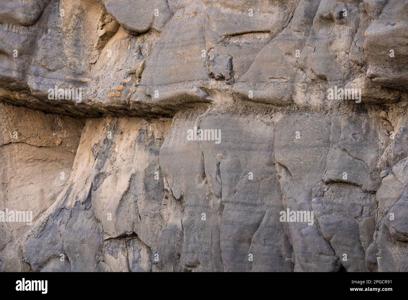 Desert with rough dry uneven surface of rocky cliff in Tabernas desert ...