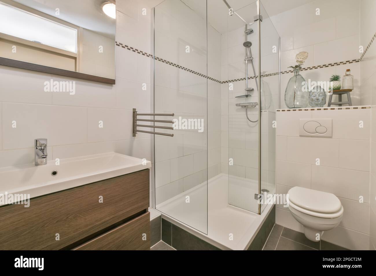 Interior design of bathroom with inside shower cabin while mirror ...