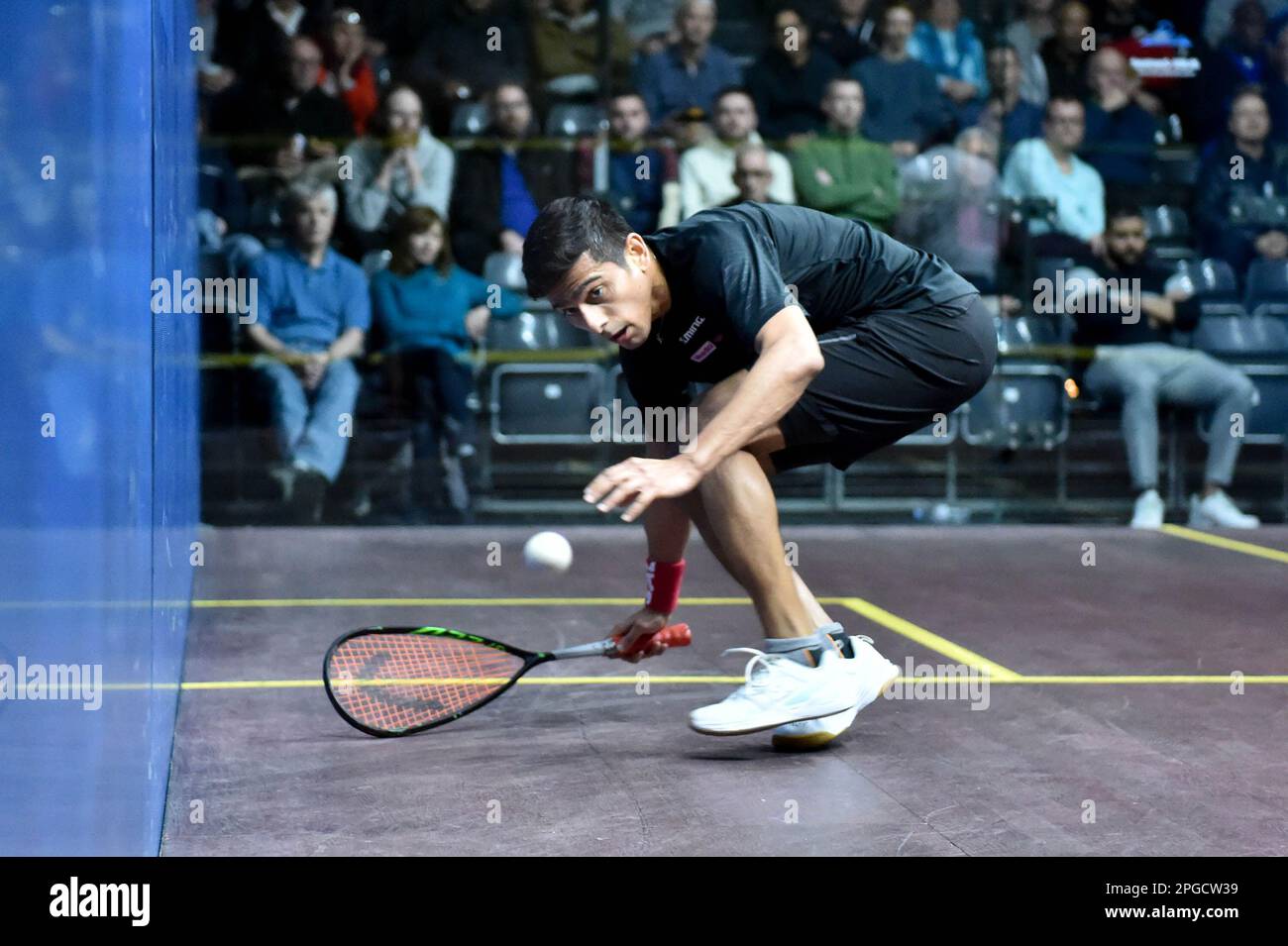 London, UK on 21 March 2023. Saurav Ghosal (India) takes on Auguste ...