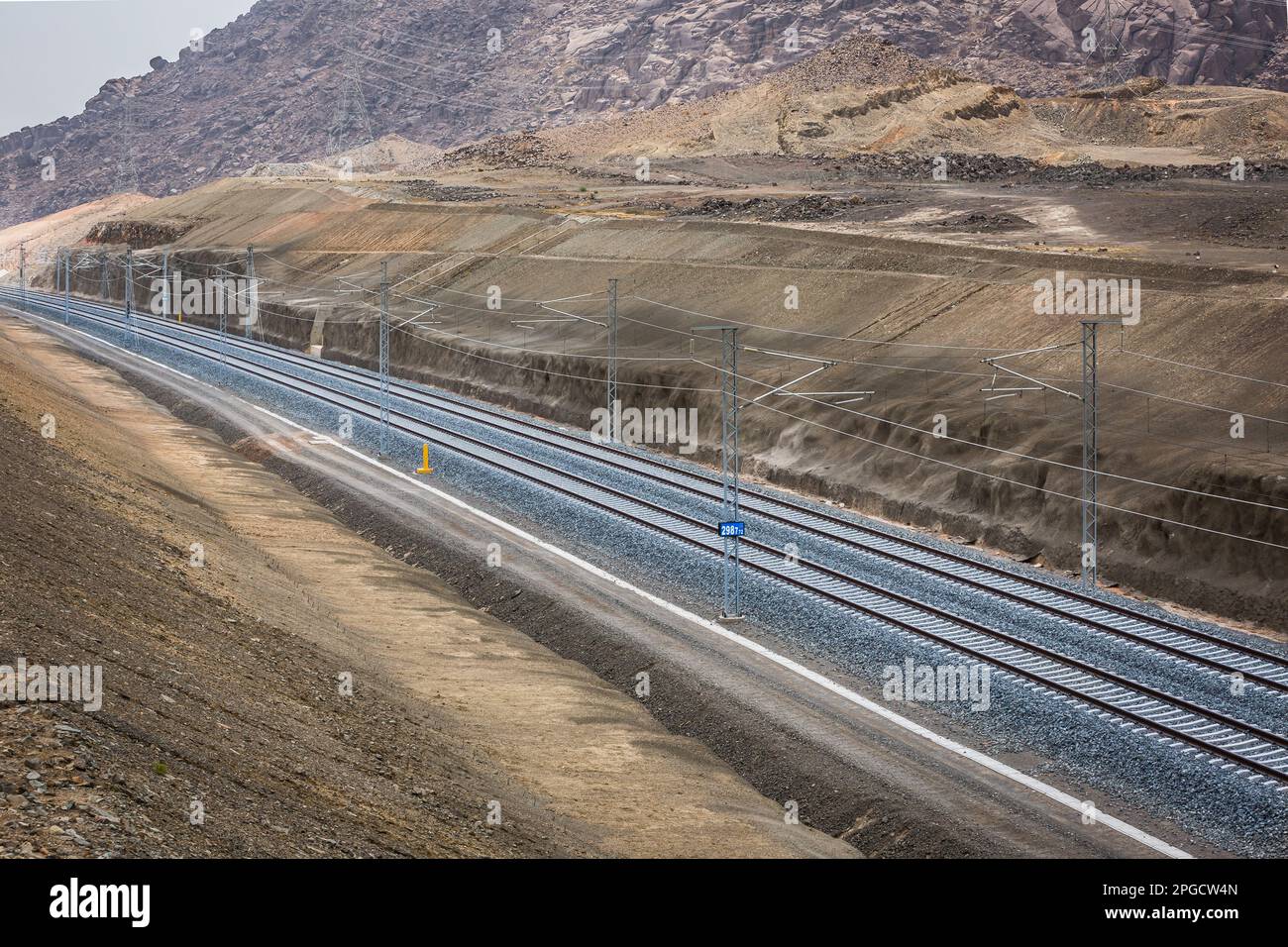 Aerial view of dry mountains with digging under infrastructure ...