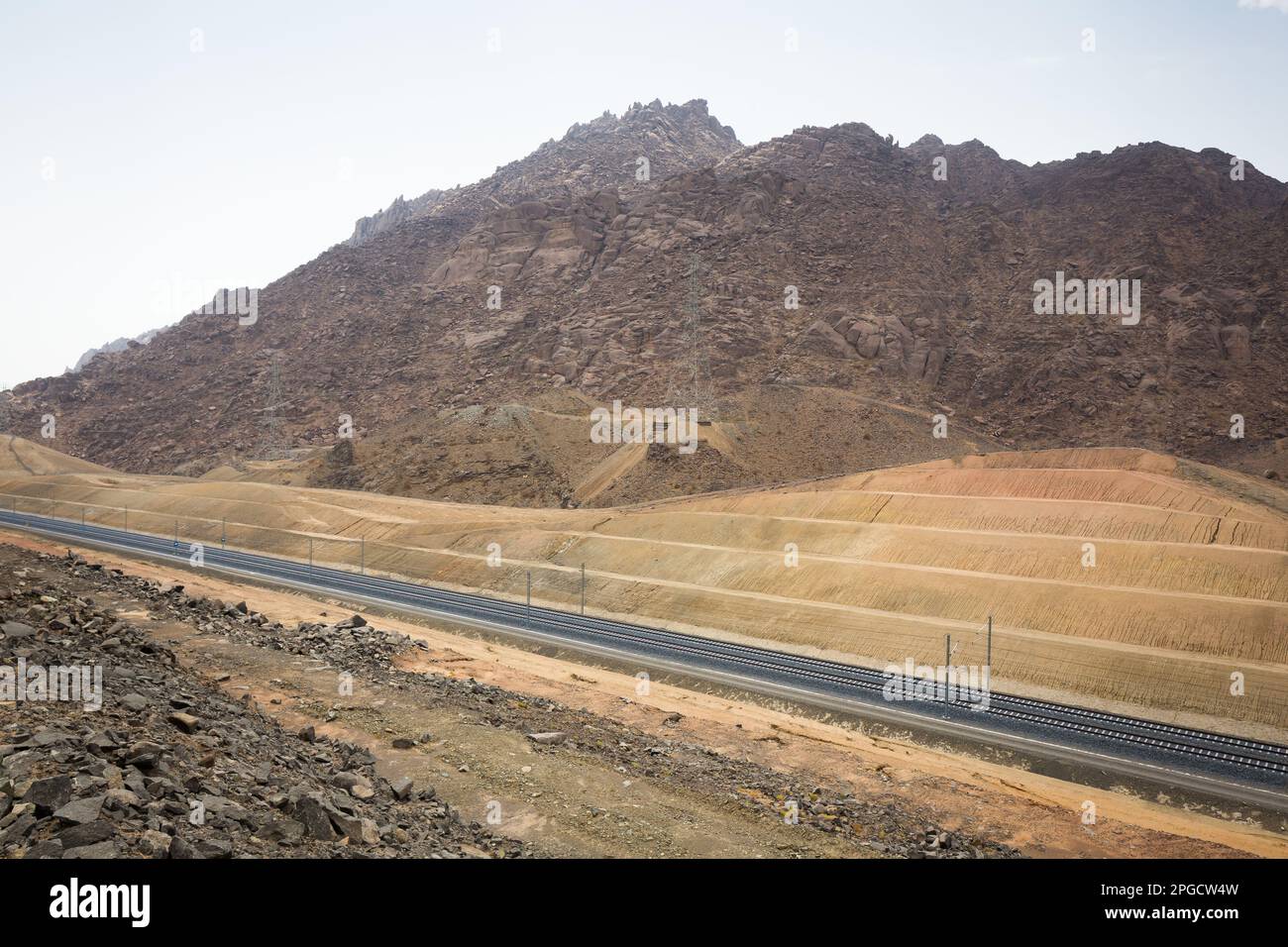 Aerial view of dry mountains with digging under infrastructure ...