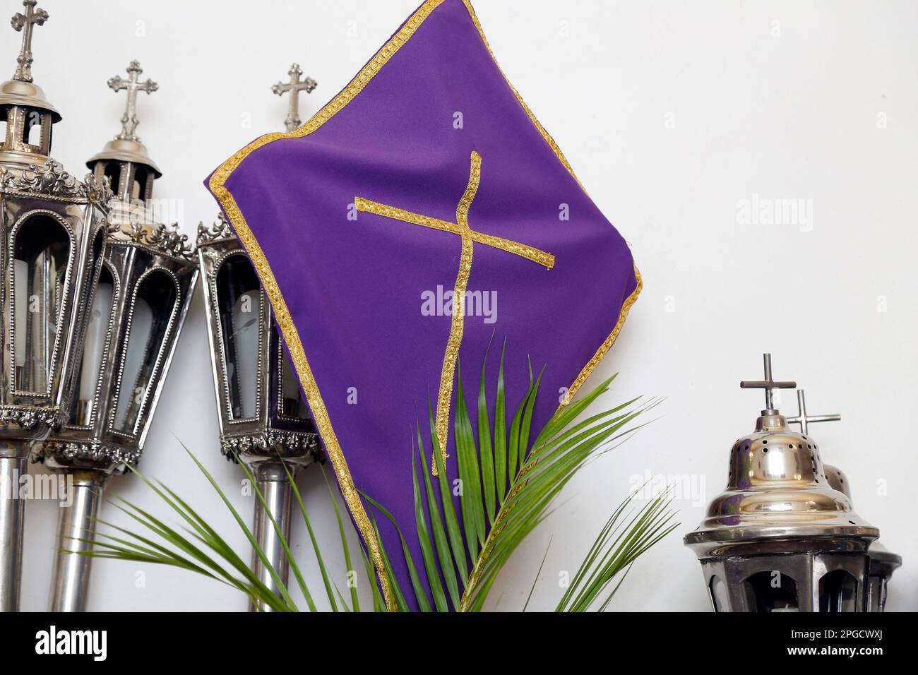 Holy Week. Cross covered with purple fabric in the period of lent. Traditional Catholic ...