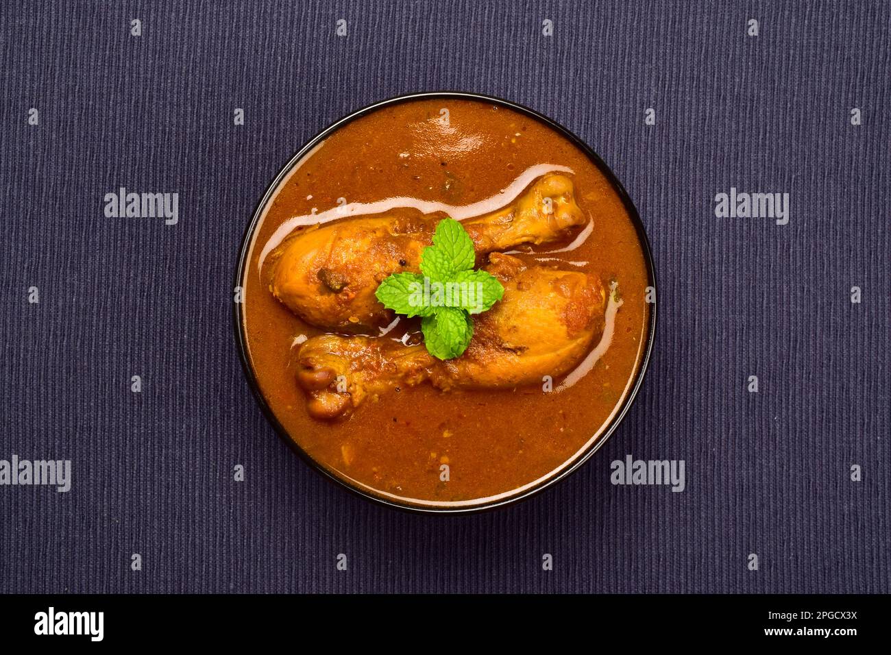 Top view of chicken curry in bowl, tari wala murga Stock Photo - Alamy