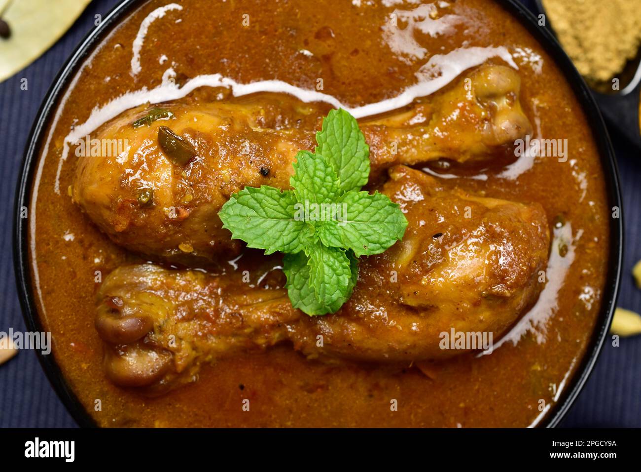 Spicy masala chicken curry top view Stock Photo - Alamy