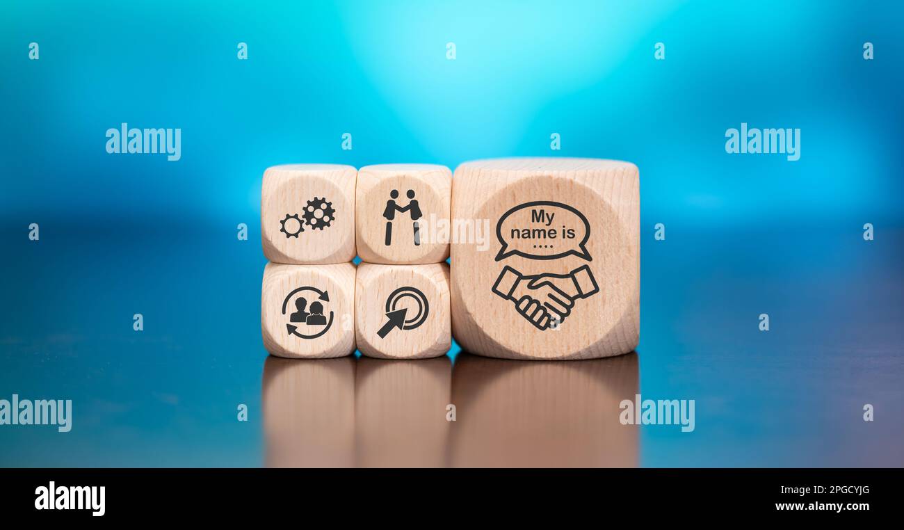Wooden blocks with symbol of introduction concept on blue background ...