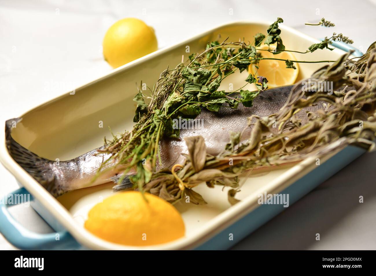 Preparing seafood fish for cooking.