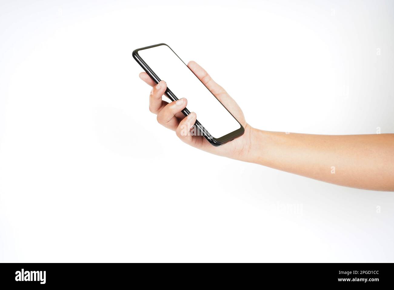 White screen phone in hand on white background Stock Photo - Alamy