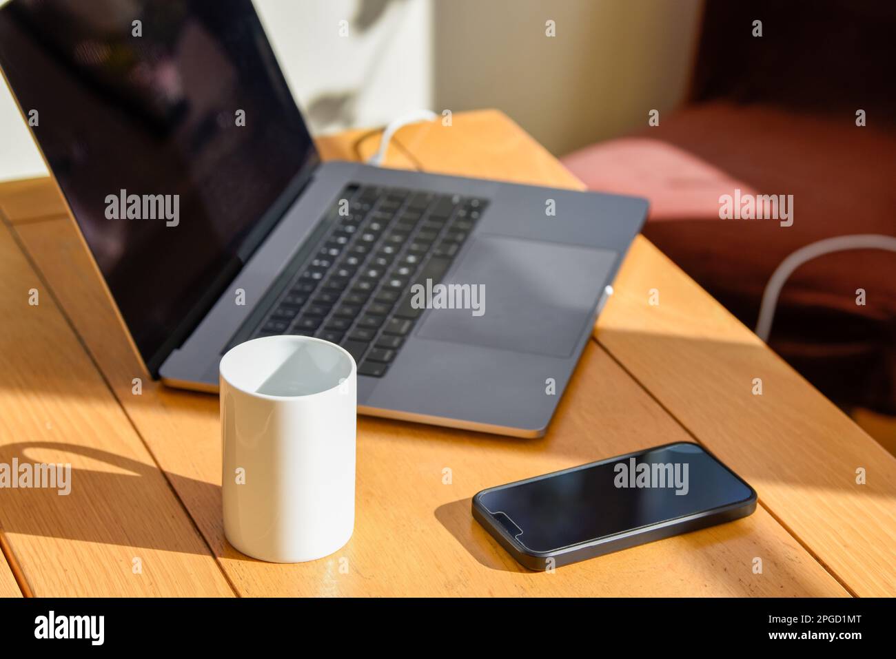 Remote working area with laptop setup to work from home Stock Photo - Alamy