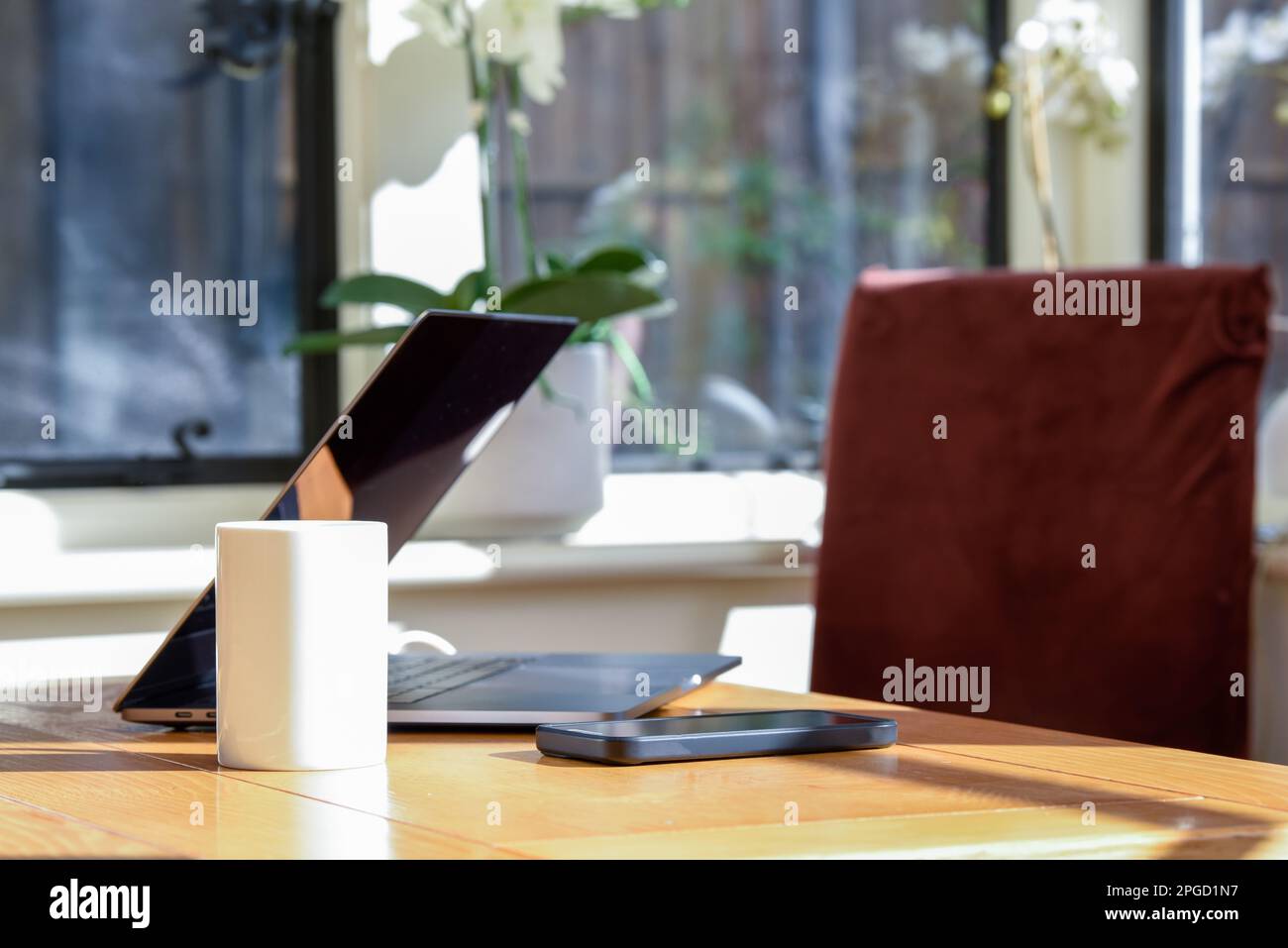 Remote working area with laptop setup to work from home Stock Photo - Alamy