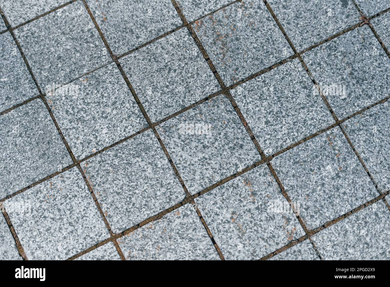 Textured background. Close uo detailed view of graphite urban floor ...