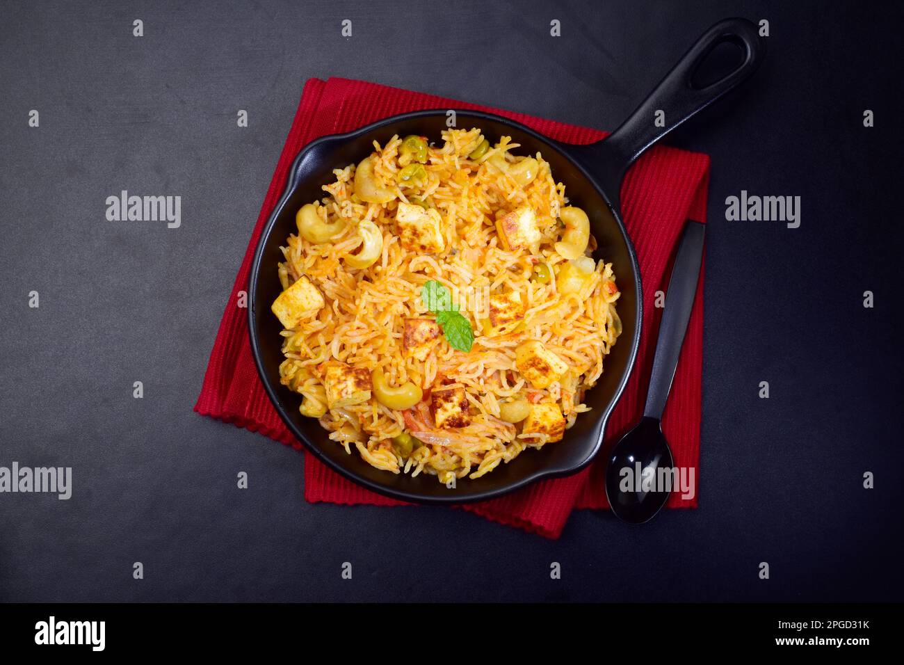 Matar paneer pulao in plate on dark background, indian food Stock Photo ...