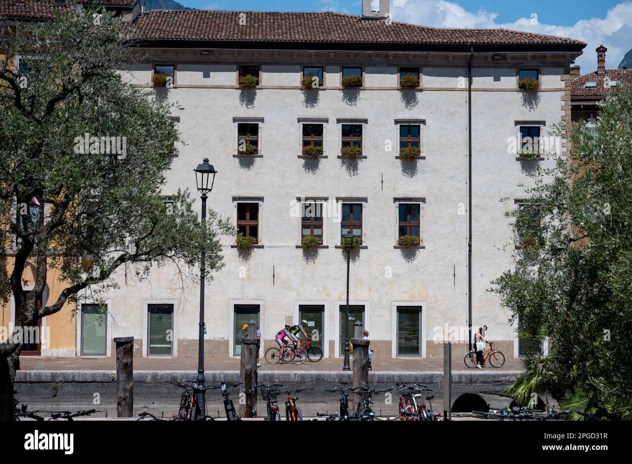 Tradional stucco and shuttered window building on the waterfront in ...