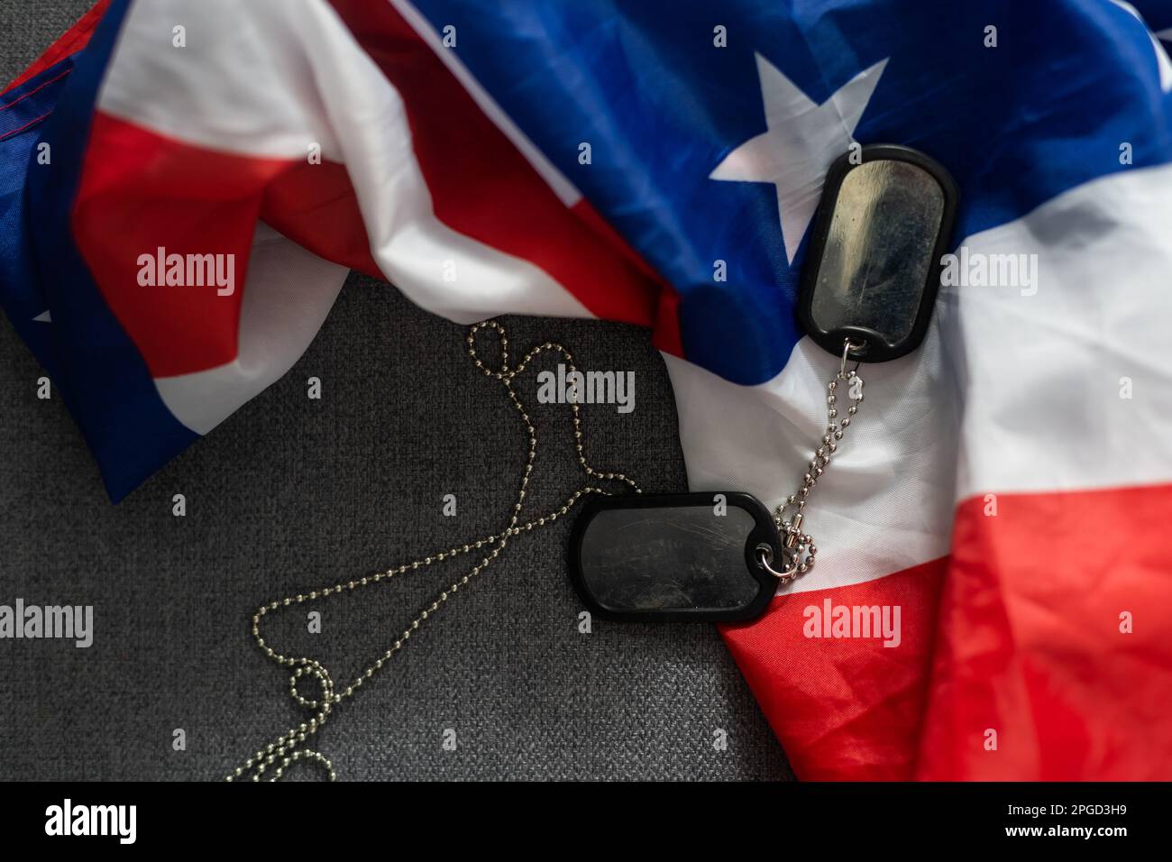 Army tokens on military uniform and USA national flag background Stock ...