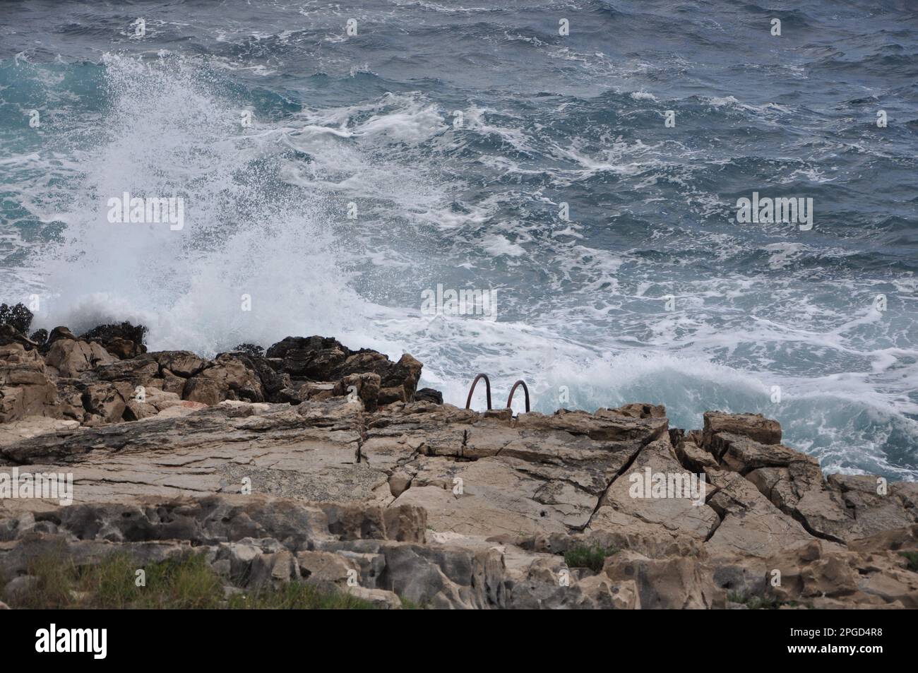 Sea splashing on rocky coast hi-res stock photography and images - Alamy