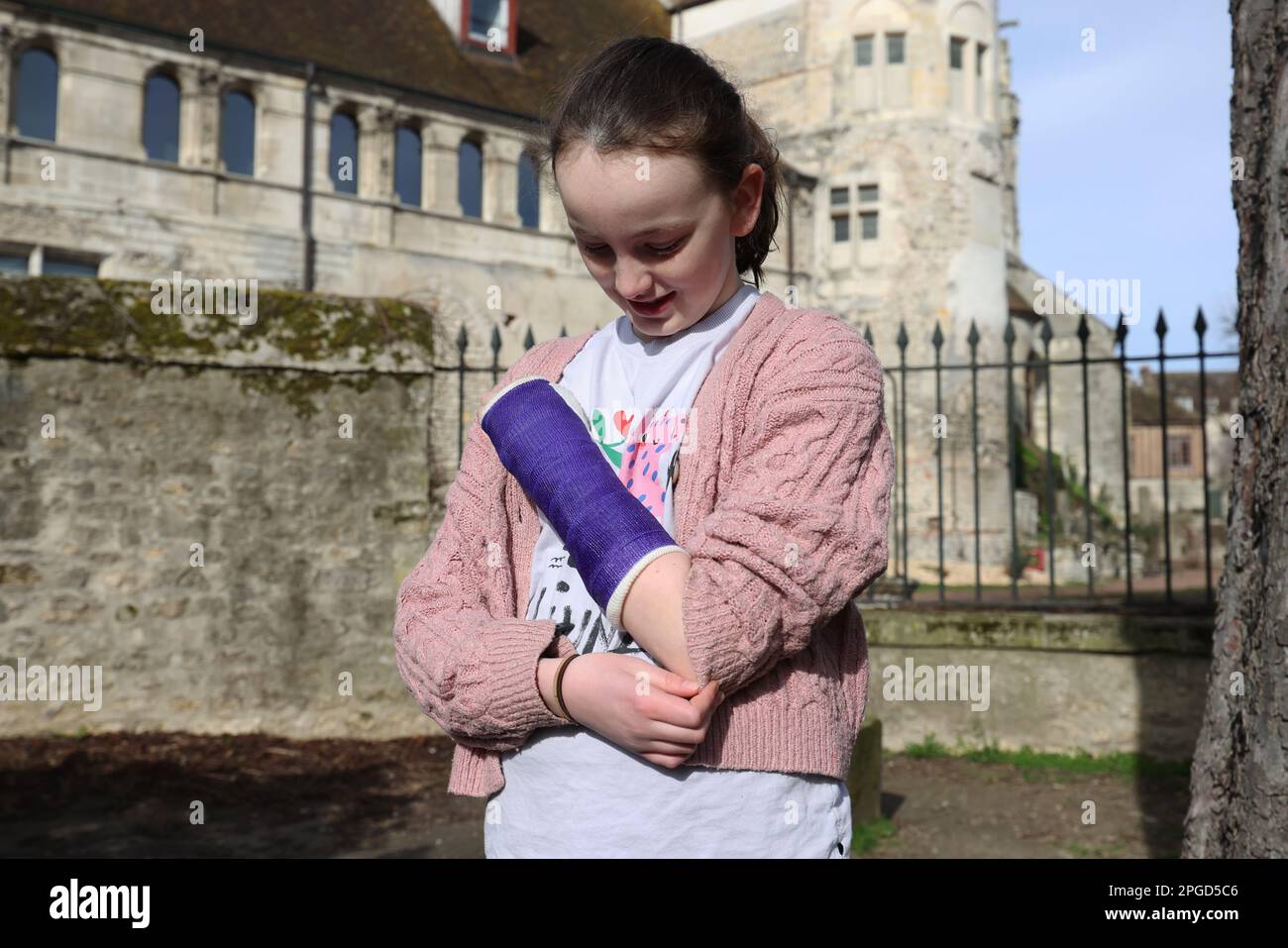 An eleven year old girl pictured with a plaster cast on her broken ...