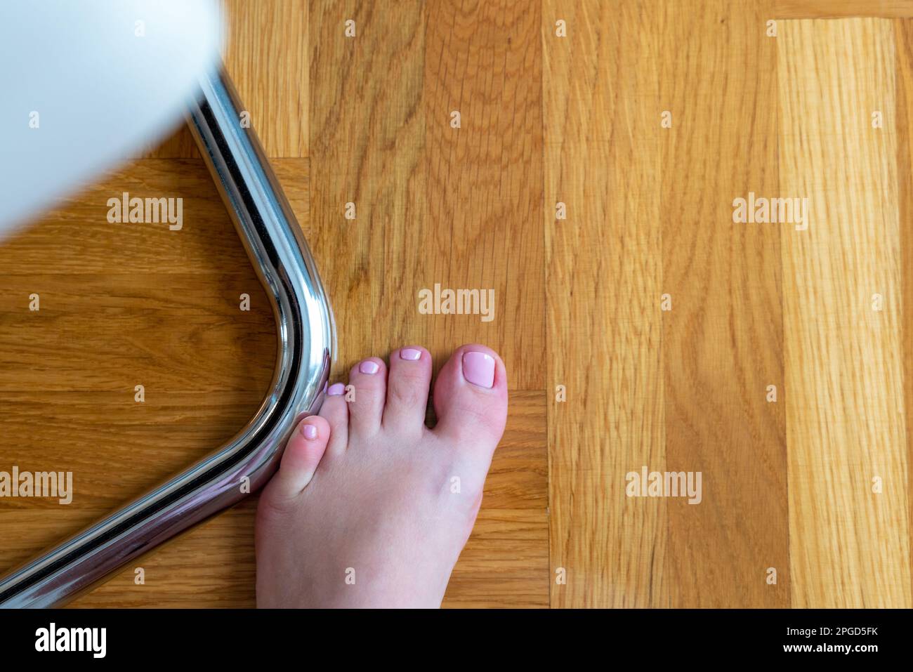 Woman hit furniture with the little toe. Incident at home. Injury of ...
