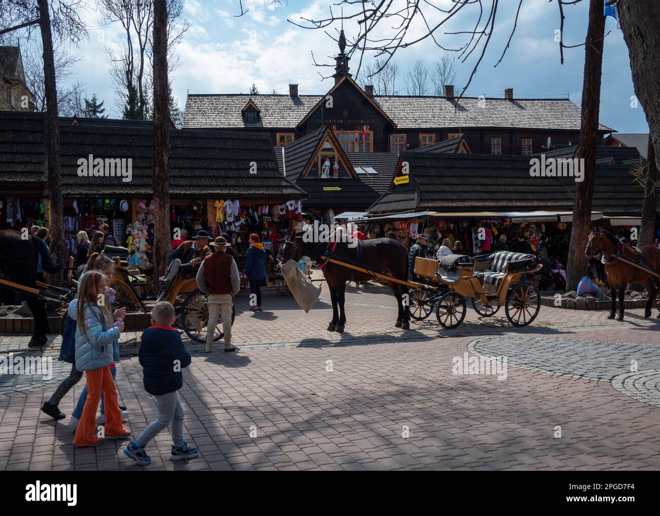 View of Souvenir shops on the streets selling winter clothes, colorful ...
