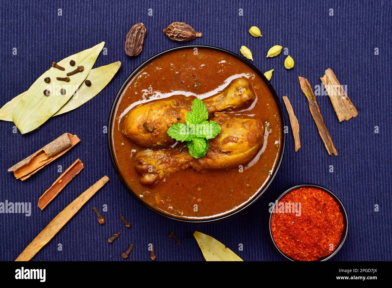 Spicy chicken curry with whole spices, indian style non veg Stock Photo ...