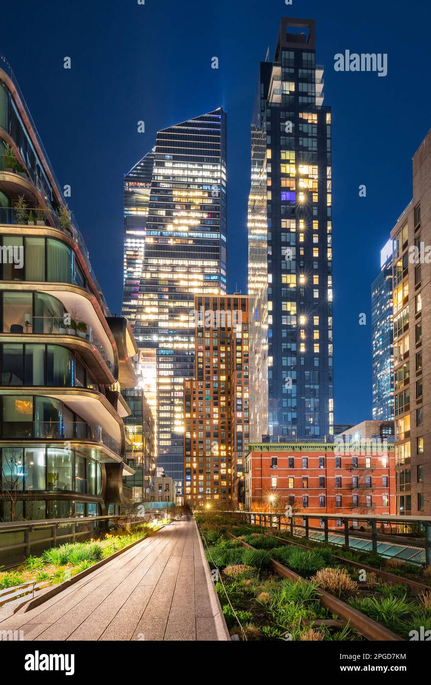 New York City Highline promenade with Hudson Yards skyscrapers at night ...
