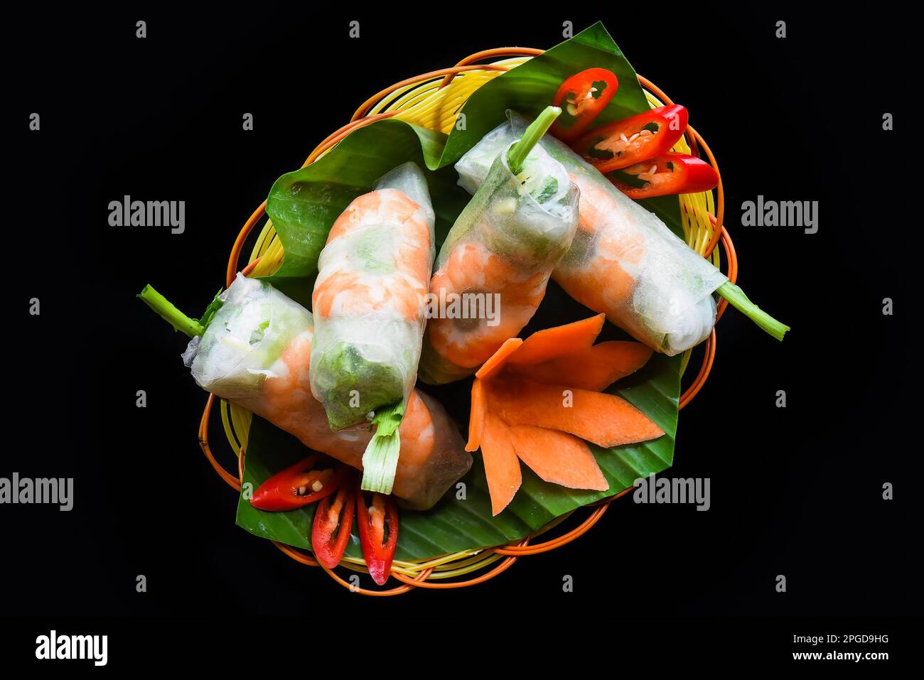 Traditional vietnamese spring rolls with shrimps, rice paper on black ...