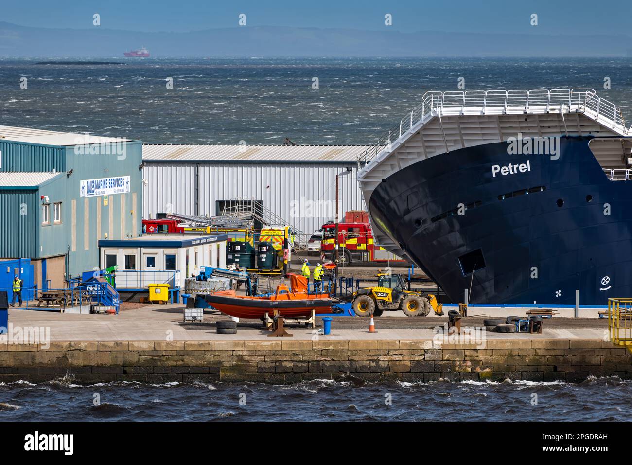 Leith Harbour, Edinburgh, Scotland, UK, 22nd March 2023. Petrel ship listing at 45 degrees: The ...