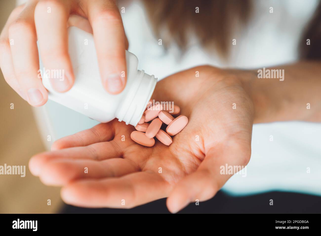 Hand shaking bottle hi-res stock photography and images - Alamy