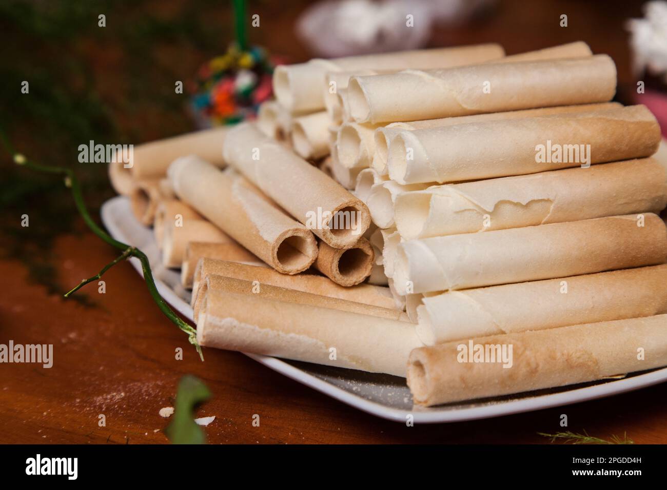 Buffet At Social Event, Dish With Wafer Roll Sticks Stock Photo - Alamy