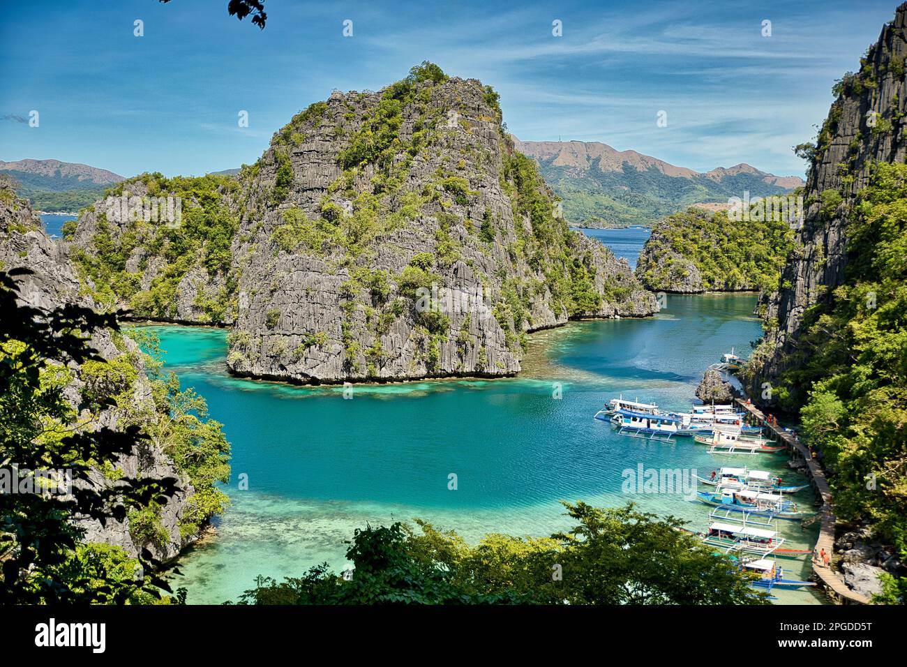 A bay with majestic rocks in Coron, Palawan in the Philippines that are ...