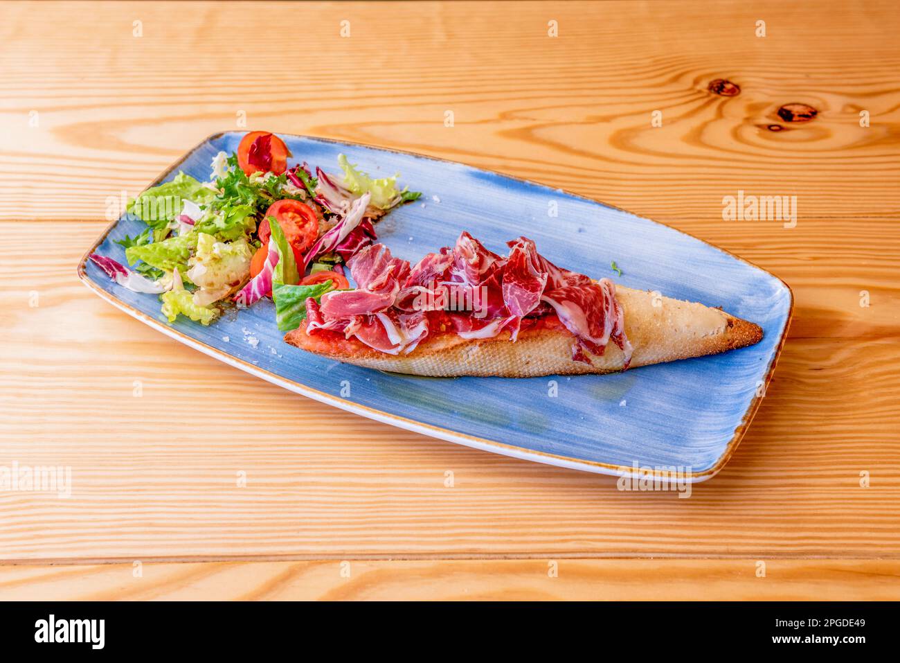 Iberian ham is a type of serrano ham from the Iberian pig, highly ...