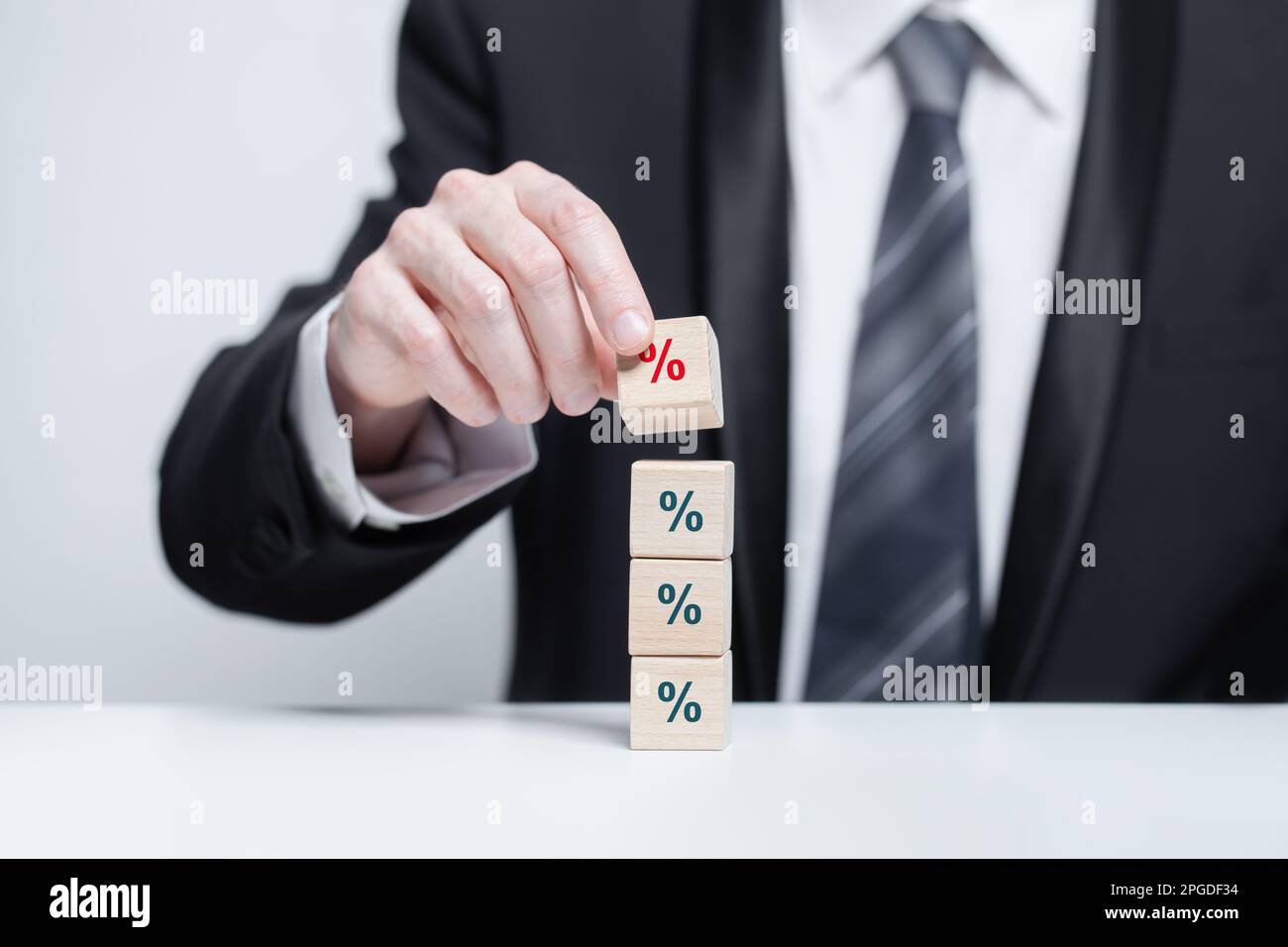 Wooden blocks with green percent signs, pyramid, business percentage ...