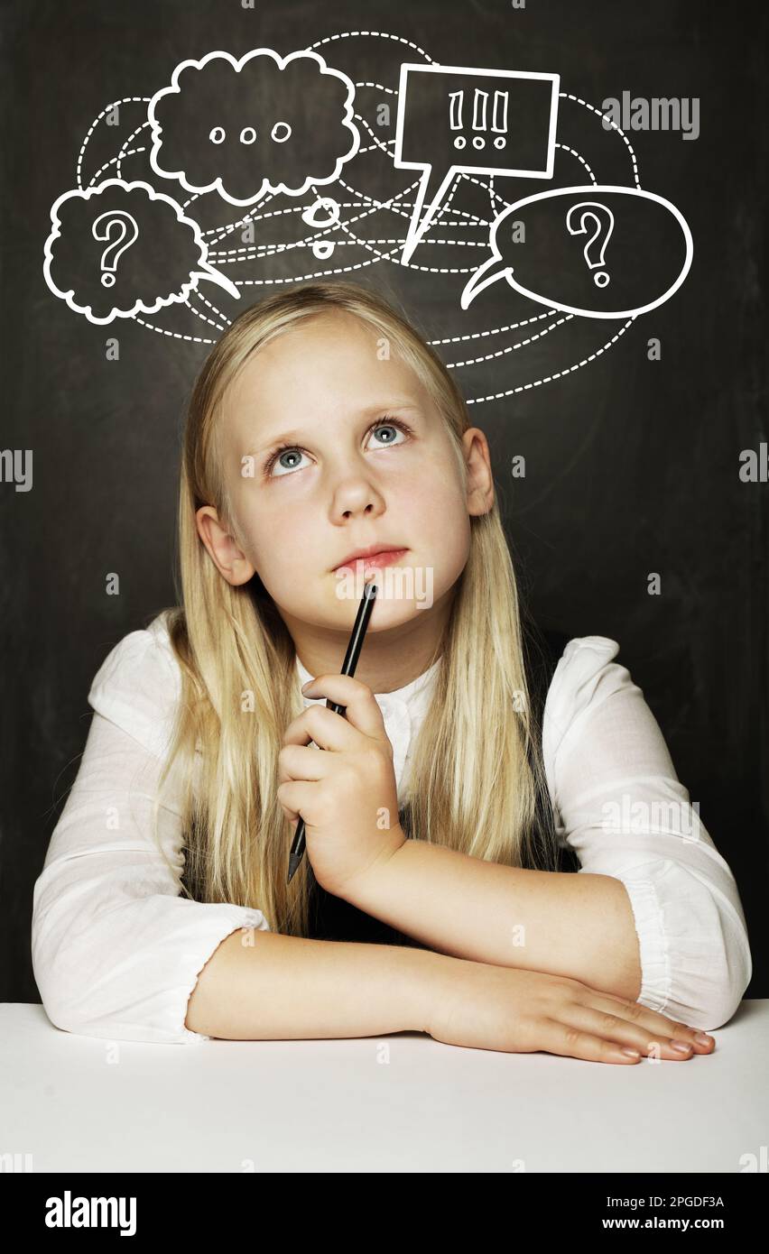 Pupil thinking in classroom, education concept, girl with question mark ...