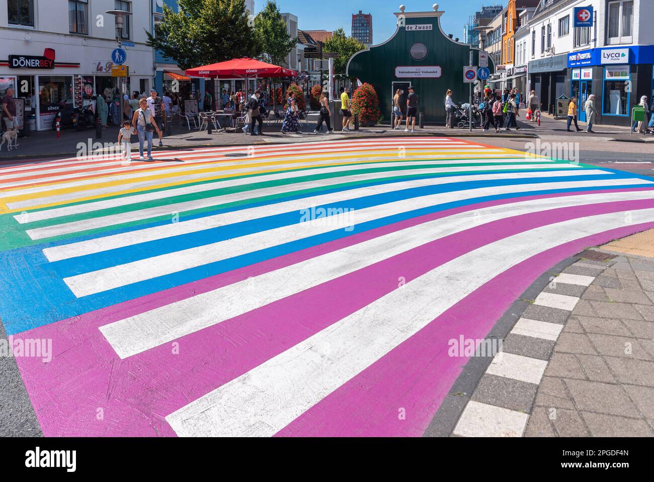 Multicolored pedestrian crossing on the corner of Westzijde and ...