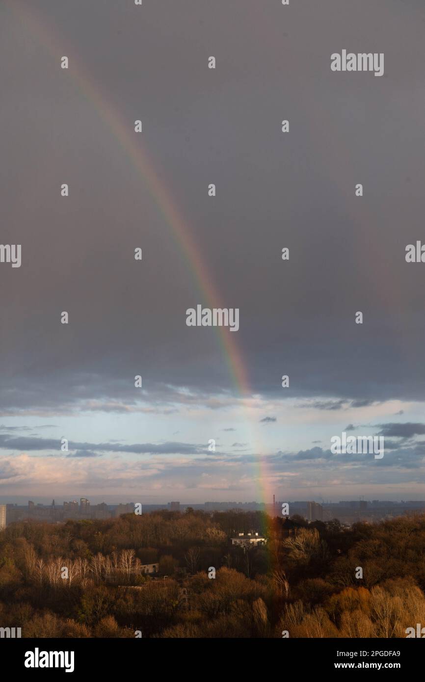 Double rainbow against the sunset sky. Leprechaun at the end of the ...