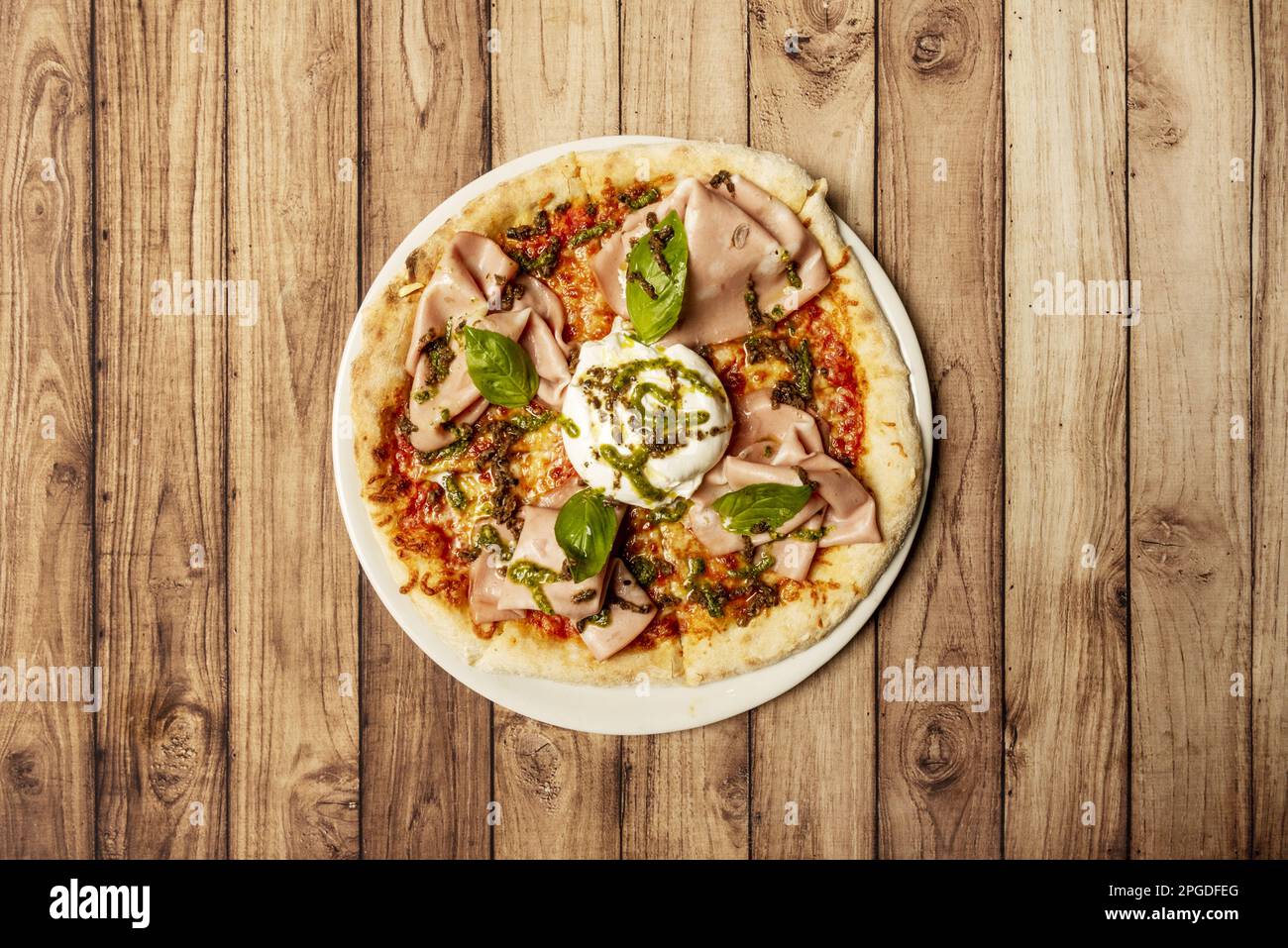 Bufalina base pizza made with a mixture of flour, salt, oil and water ...