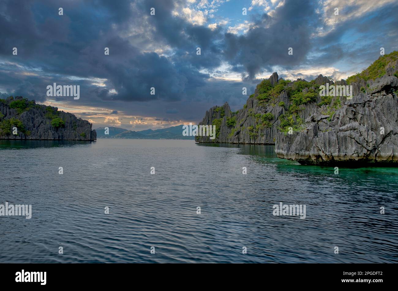 A bay with majestic rocks in Coron, Palawan in the Philippines that are ...