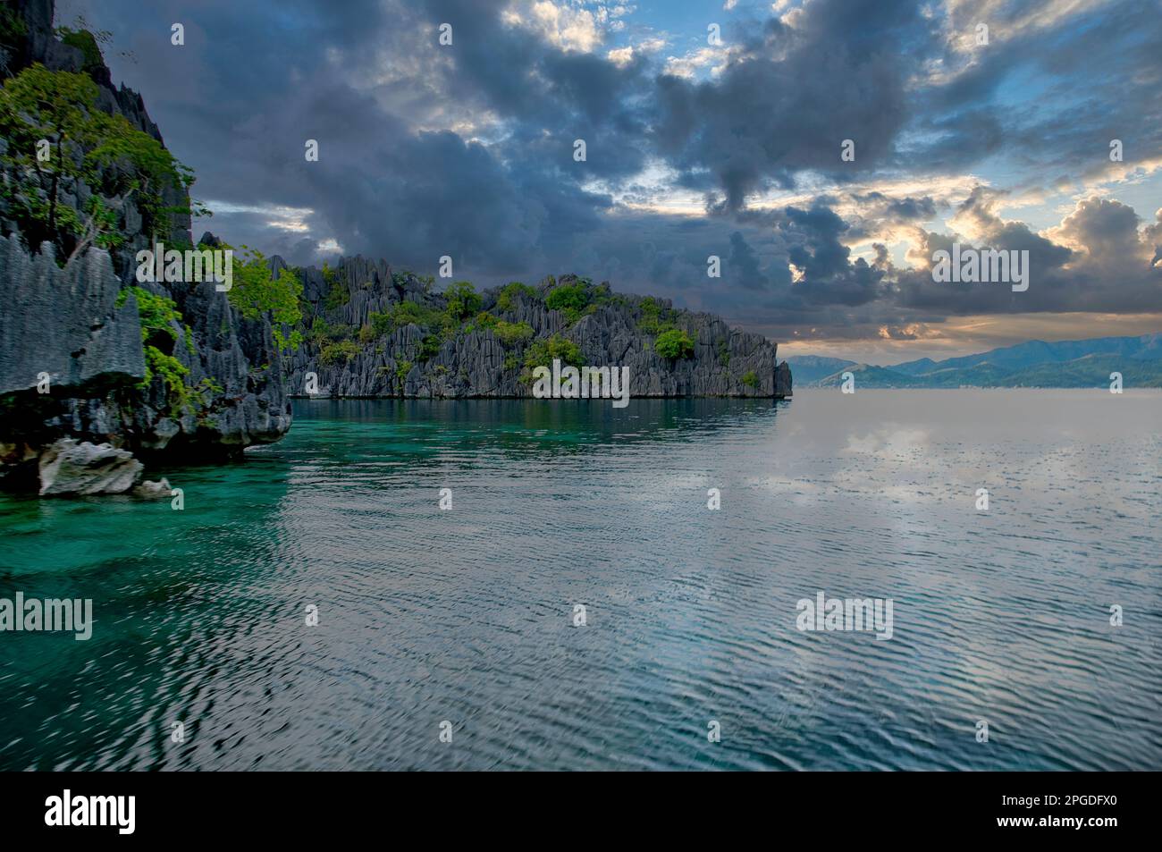 A bay with majestic rocks in Coron, Palawan in the Philippines that are ...