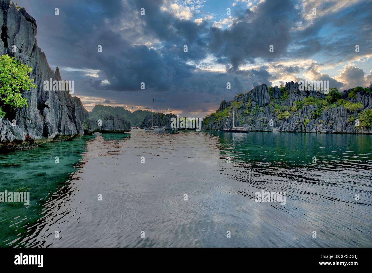 A bay with majestic rocks in Coron, Palawan in the Philippines that are ...