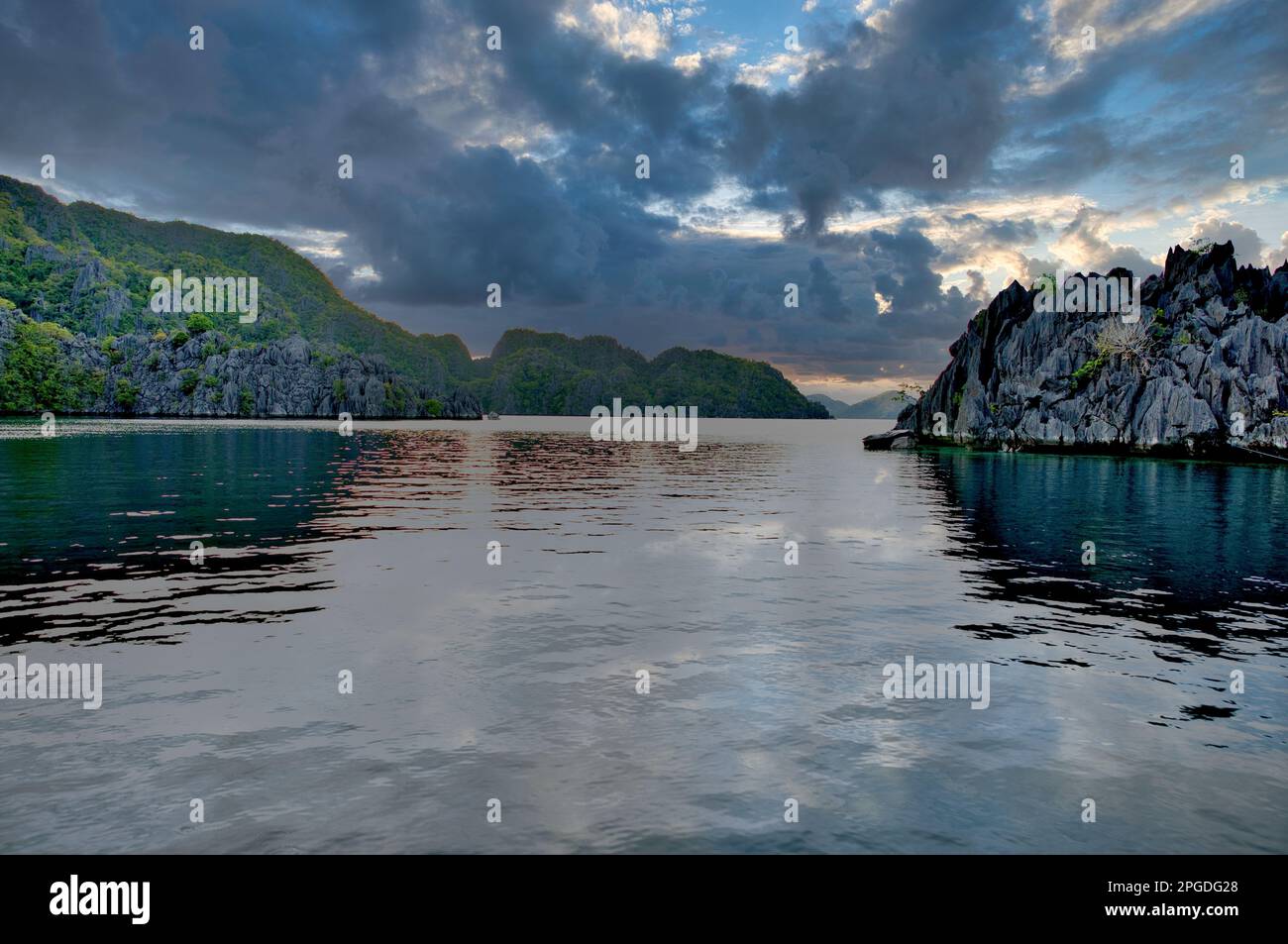 A bay with majestic rocks in Coron, Palawan in the Philippines that are ...