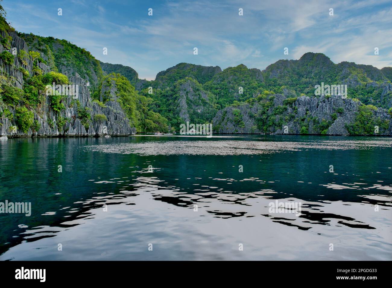 A bay with majestic rocks in Coron, Palawan in the Philippines that are ...
