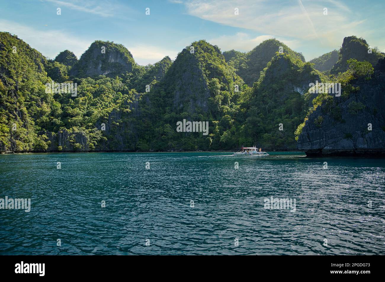 A bay with majestic rocks in Coron, Palawan in the Philippines that are ...