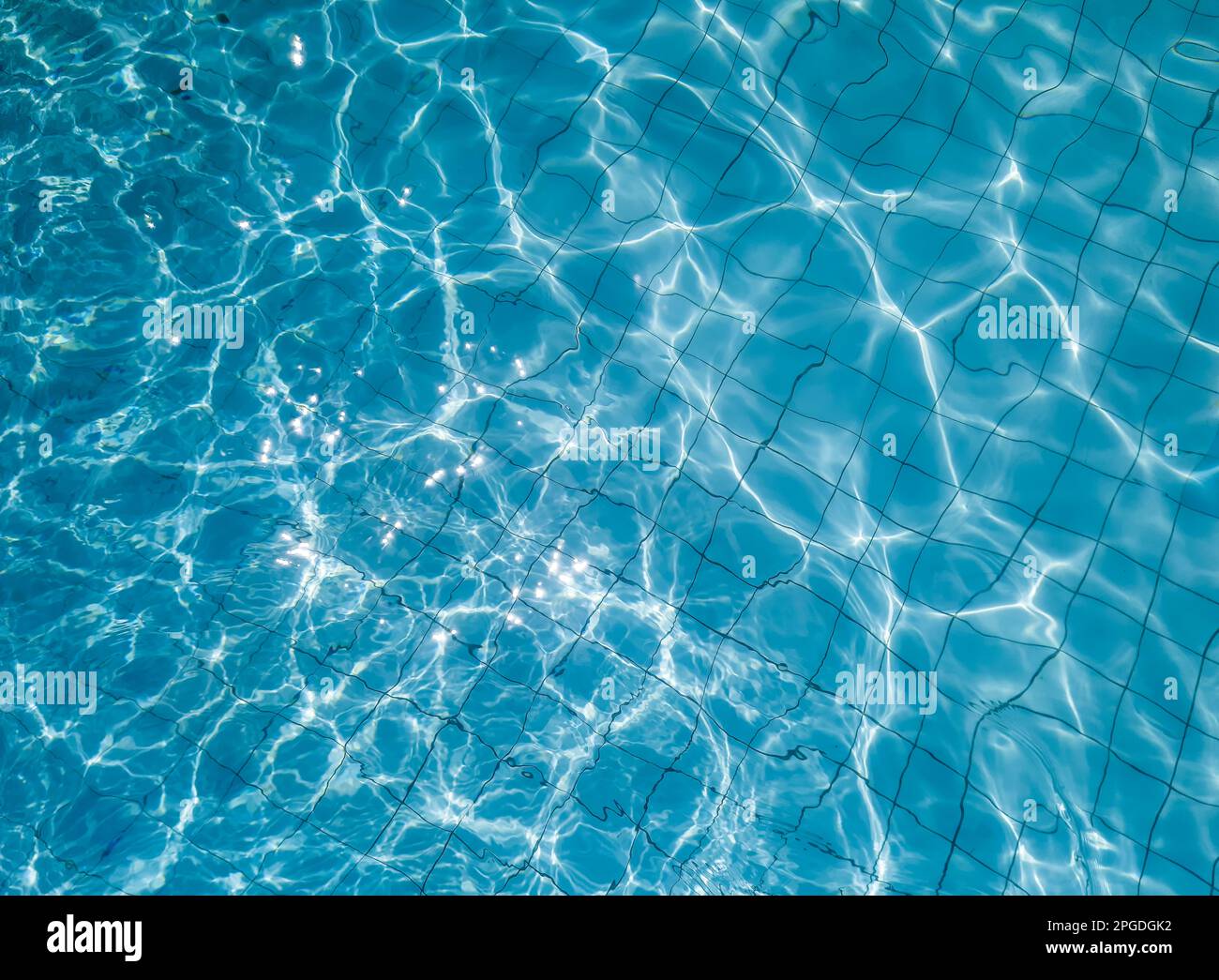 Ripple Water in swimming pool - ripple water with sun reflection Stock ...