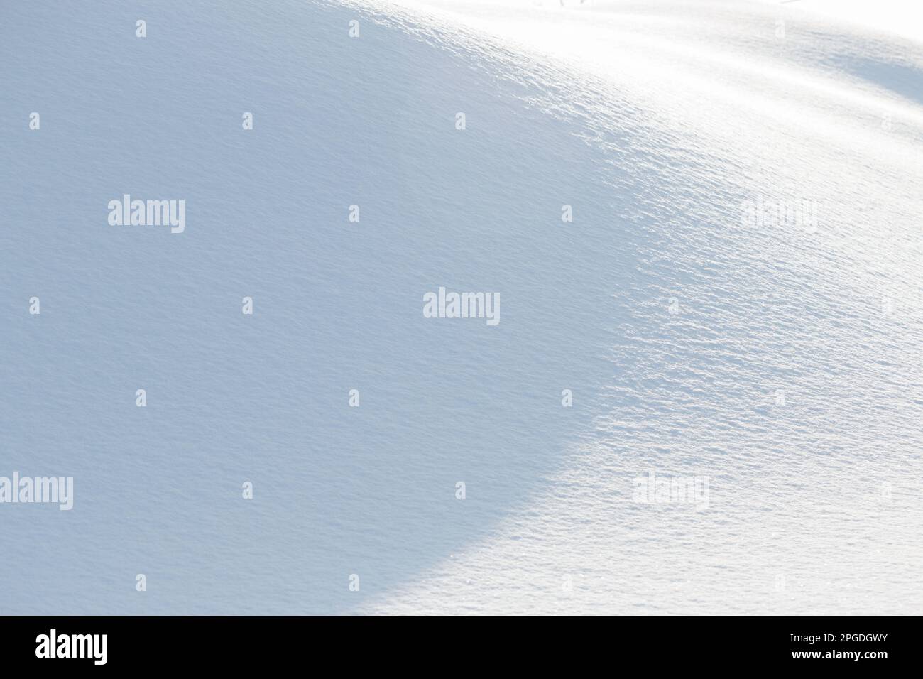 Curved shadow on fresh white snow background Stock Photo - Alamy
