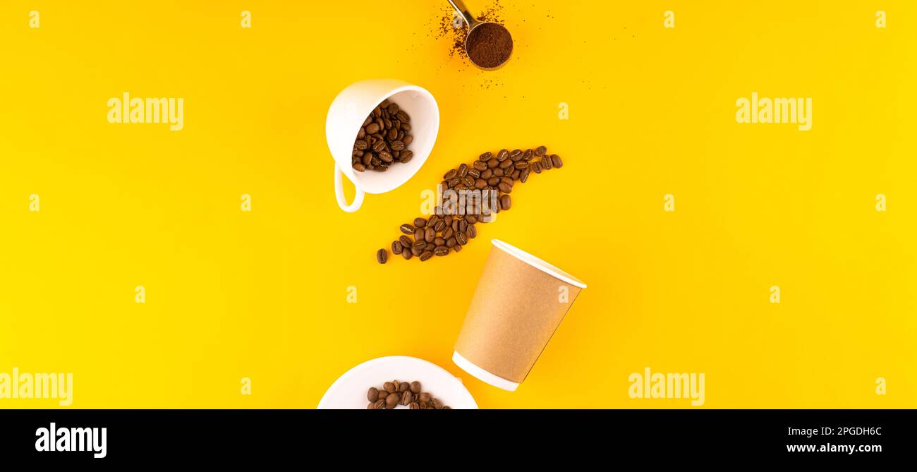 eco friendly coffee accessories. White coffee cup and paper cup with ...