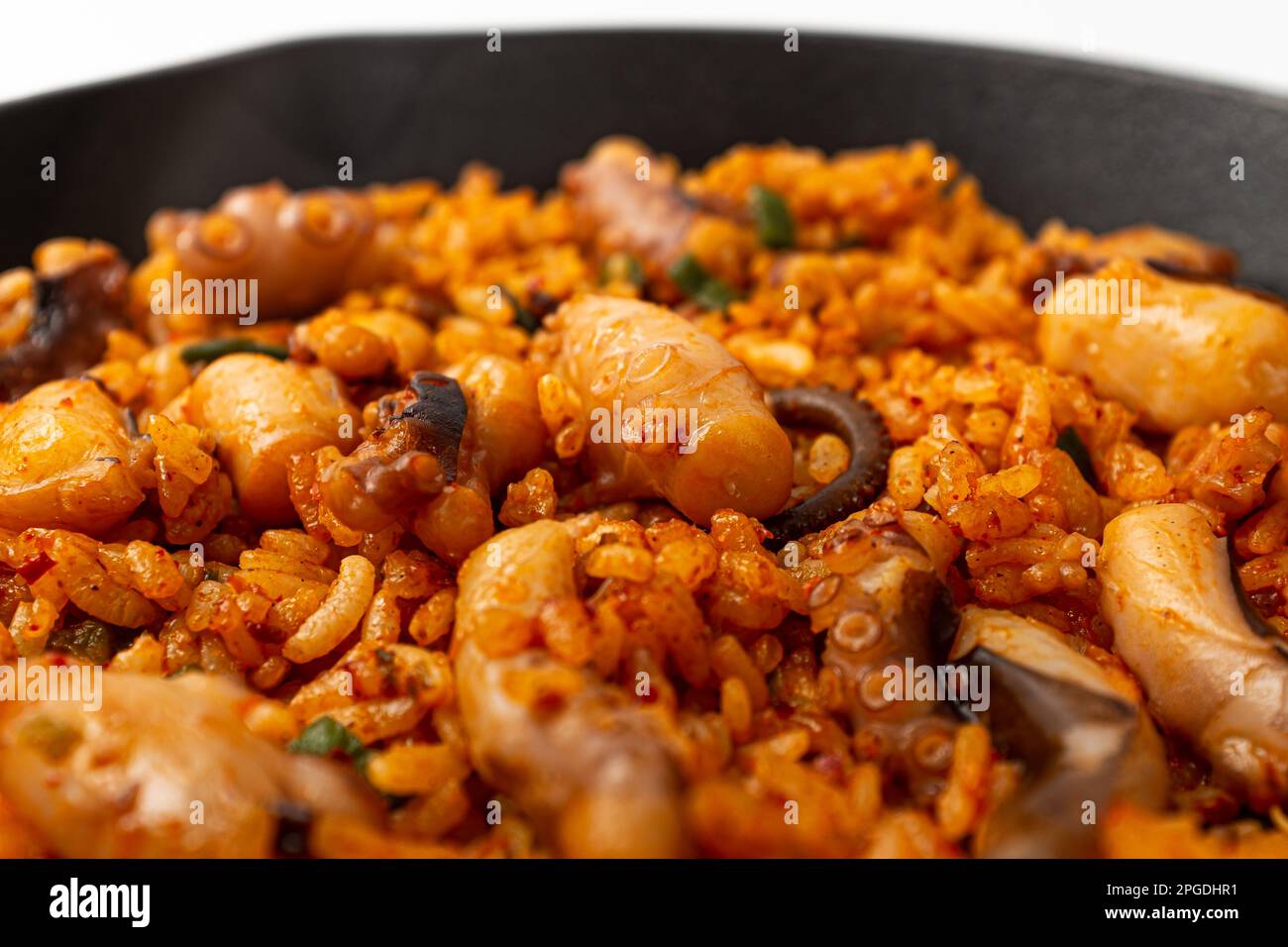 Octopus fried rice on white background Stock Photo - Alamy