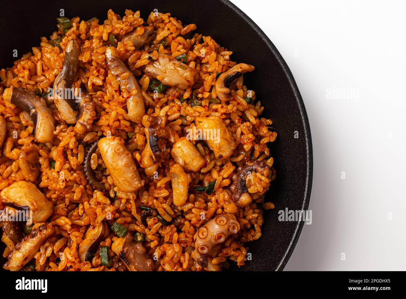 Octopus fried rice on white background Stock Photo - Alamy