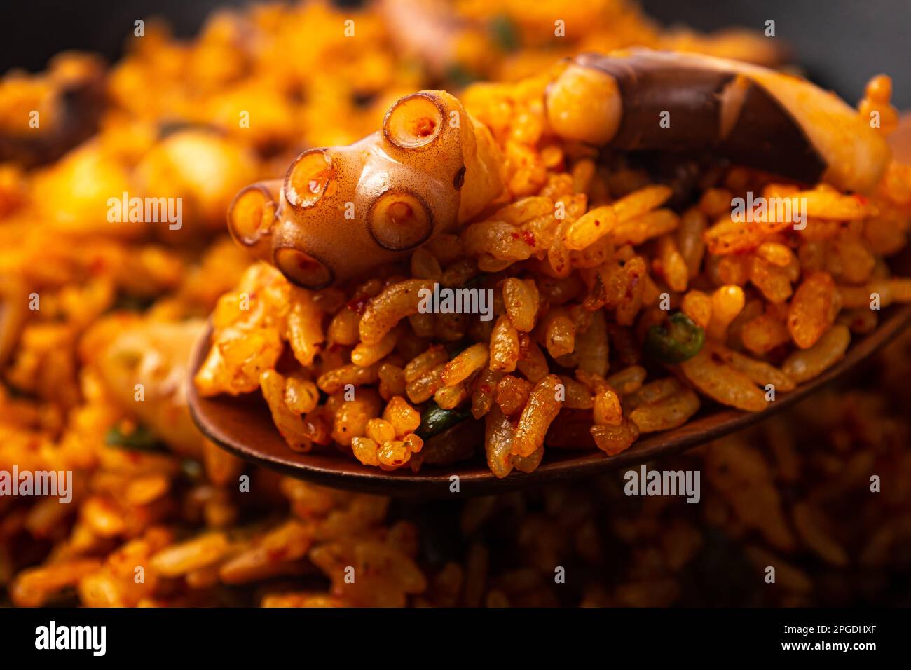 Spicy seasoned octopus fried rice with octopus Stock Photo - Alamy