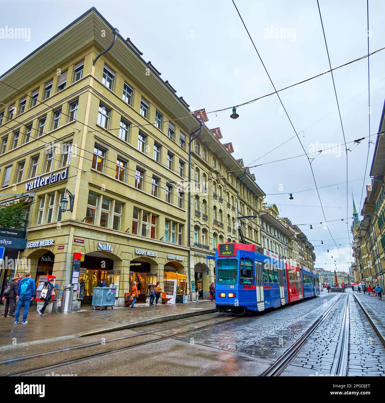 BERN, SWITZERLAND - MARCH 31, 2022: Colorful tram rides along ...